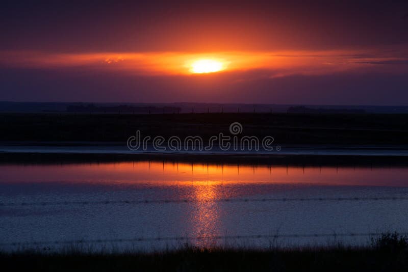 Prairie Sunset and Snow Mountain Stock Photo - Image of snow, mountain ...