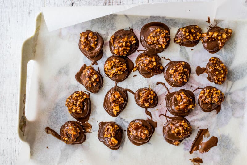 Praline Chocolate with Walnut, Almond, Peanut or Croquant Stock Image ...