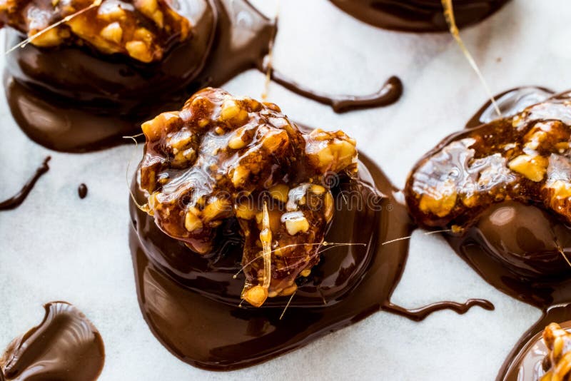 Praline Chocolate with Walnut, Almond, Peanut or Croquant Stock Image ...