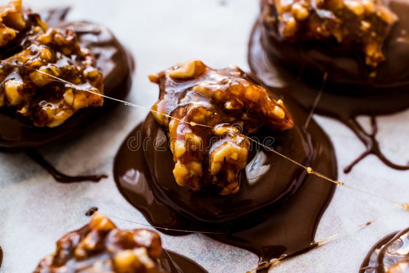 Praline Chocolate with Walnut, Almond, Peanut or Croquant Stock Image ...