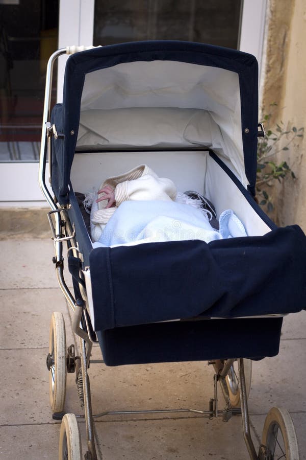 Pram with baby stock photo. Image of paternity, hand - 23403532