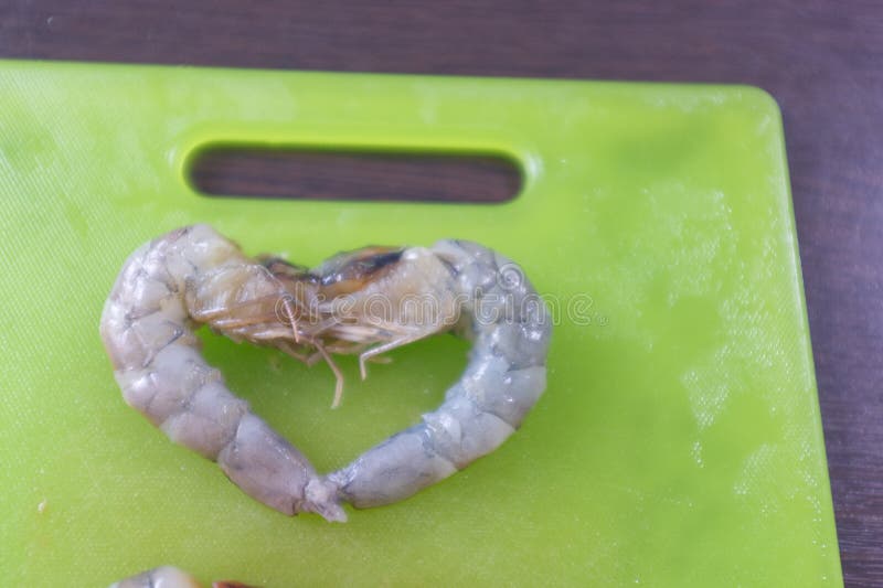 Prawn in Heart Shape Isolated on Green Background Stock Photo - Image ...