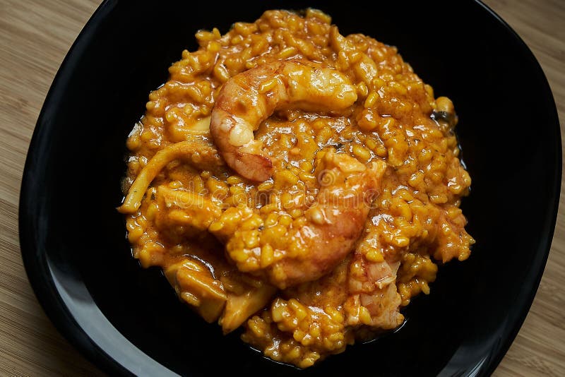 Prawn and Squid Risotto on a Table Stock Photo - Image of recipe, food ...