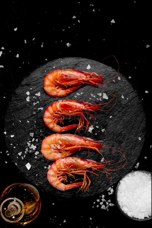 Prawns Cooked with Salt and Oil on a Stone Plate Vertical Stock Image ...