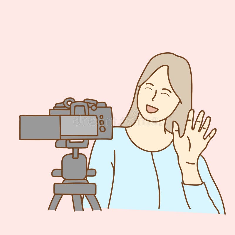 Camera Recording a Young Female Blogger Trying Clothes while Making a ...