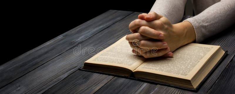 Prayer Hand on Bible Book on Dark Room Stock Photo - Image of page ...