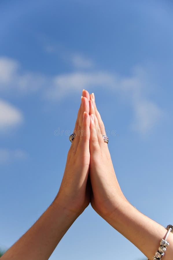 Praying Hands on Sky Background Stock Photo - Image of dramatically ...