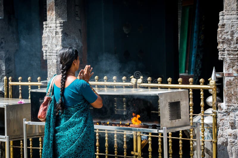 Prayer in Hindu temple editorial photo. Image of tirta - 42187166
