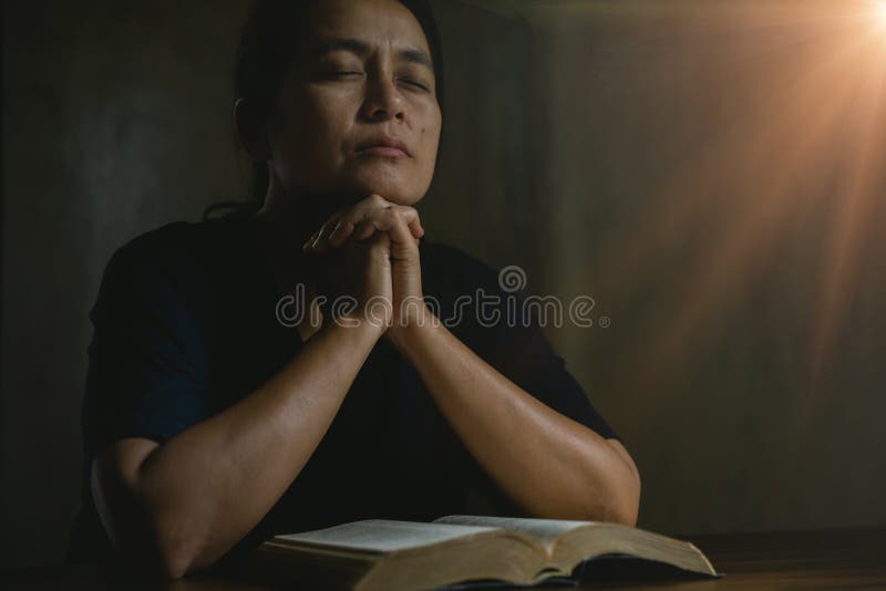 Prayer Person Hand in Black Background. Christian Catholic Woman are ... Prayer Person Hand in Black Background. Christian Catholic Woman are ...