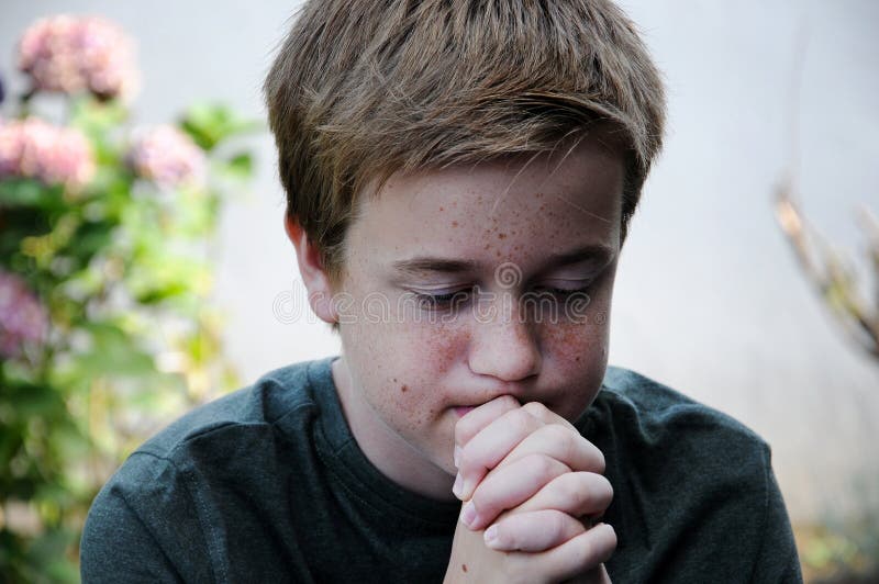 Young Boy Praying Over the Bible Stock Photo - Image of holy, devotion ...