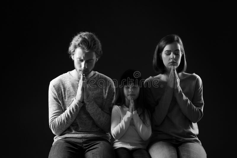 Praying Family on Dark Background Stock Image - Image of belief, hope ...