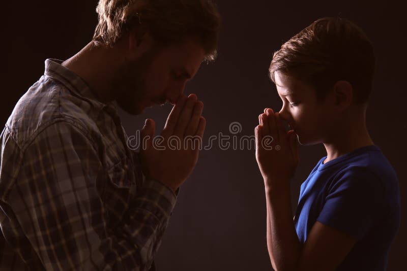 Praying Father and Son on Dark Background Stock Photo - Image of child ...