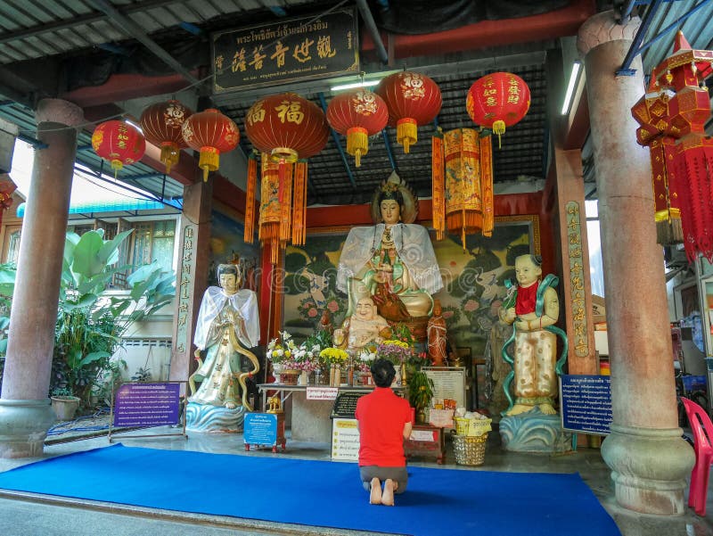 Praying in Front of a Shrine Editorial Image - Image of temple, altar ...