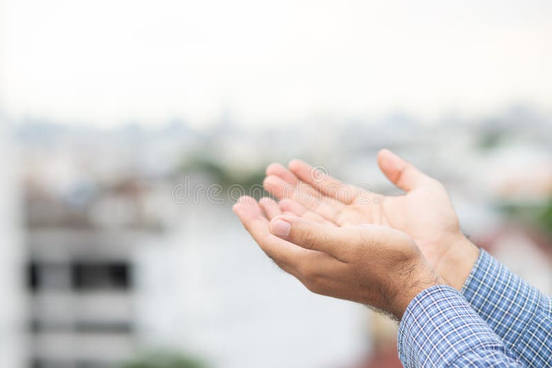 Praying Hands for Hope Stretch into the Sky. Religion and Belief ...