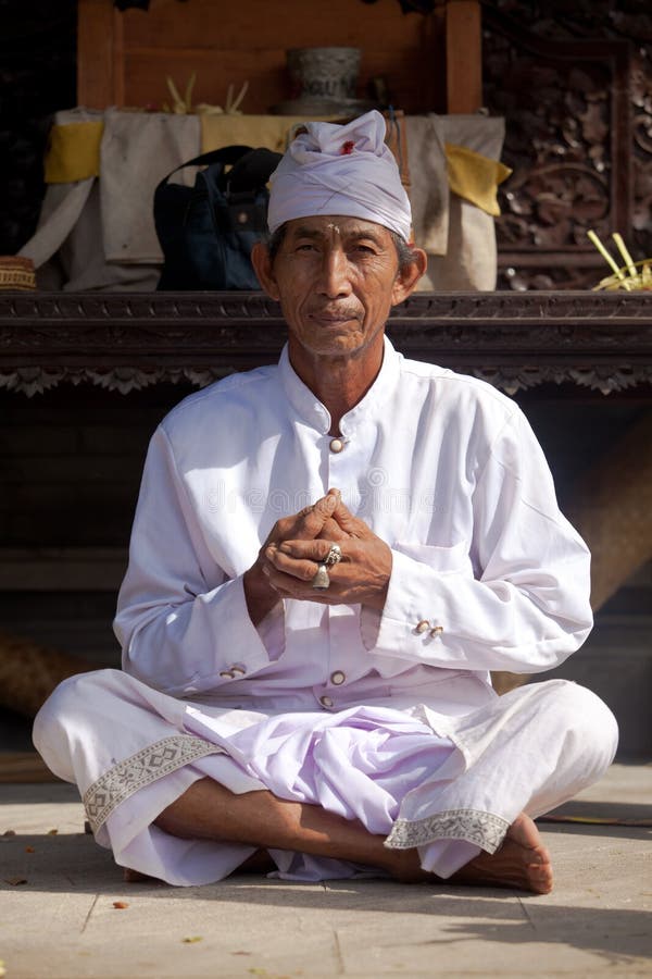Praying priest editorial photo. Image of balinese, holy - 24474611