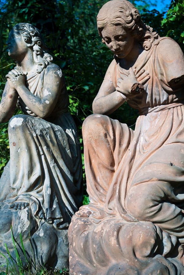 Praying Statues in Sculpted Stone. Sculptures. Stock Image - Image of ...