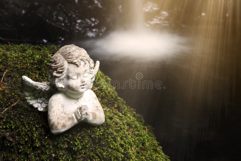 Praying Stone Angel on Moss in Front of Waterfall Stock Photo - Image ...