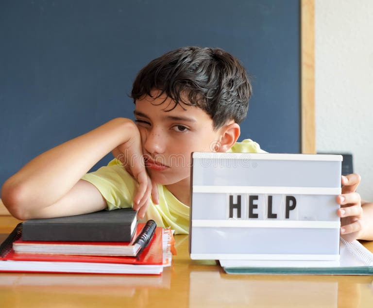 Pre-adolescent Boy Asking for Help, Overwhelmed by Homework Stock Photo ...
