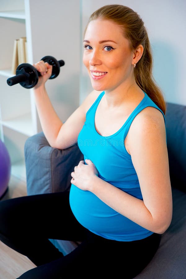 Pre-natal Exercises at Home Stock Photo - Image of woman, belly: 97165766