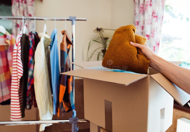 Pre Owned Clothes Resale or Donation. Stock Photo - Image of person ...