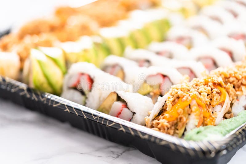 Pre-packaged sushi stock photo. Image of rice, avocado - 264769908