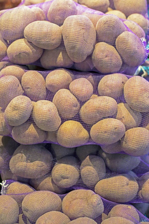 Pre-packed Varietal Potatoes in Nets in the Supermarket. Stock Image ...