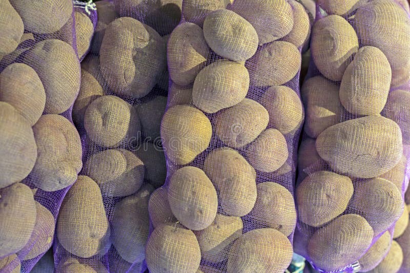 Pre-packed Varietal Potatoes in Nets in the Supermarket. Stock Photo ...