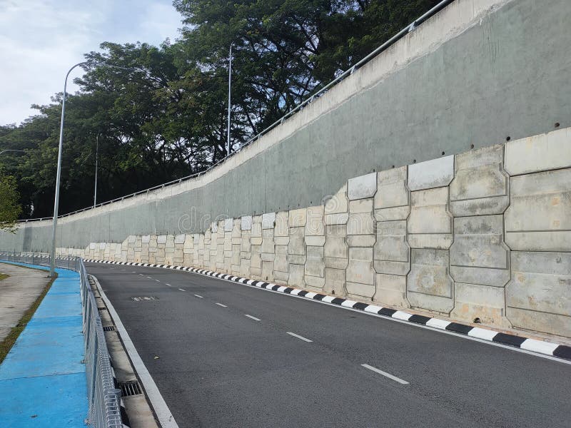 Precast Concrete Retaining Wall Panels are Installed in Layers As a ...
