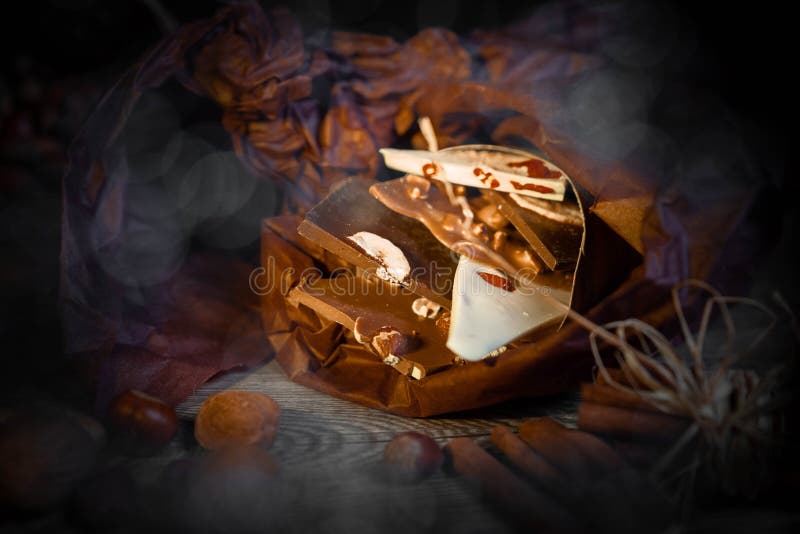 Precious Chocolate in Paper Stock Image - Image of background, candy ...