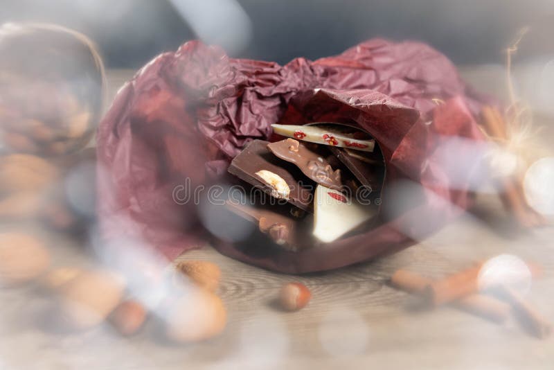 Precious Chocolate in Paper Stock Photo - Image of almond, group: 147569134