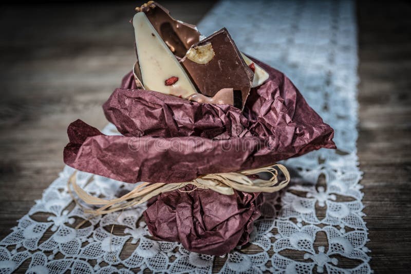 Precious Chocolate in Paper Stock Photo - Image of black, delicious ...