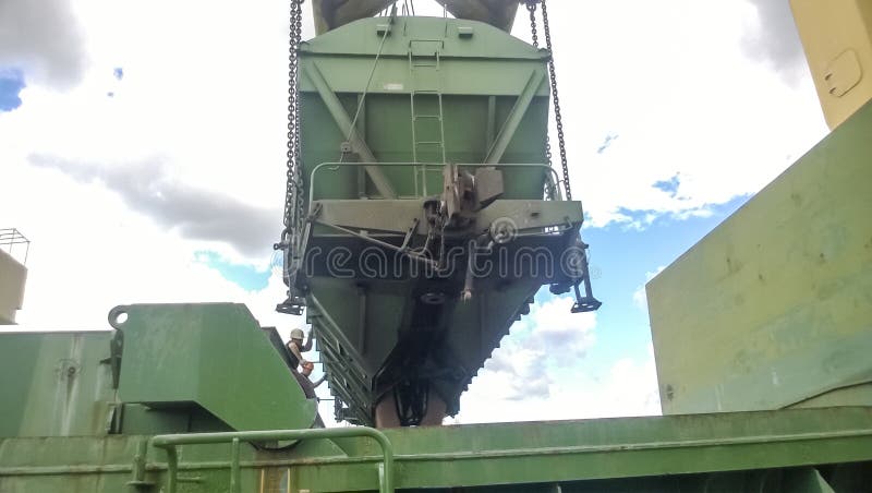 The Precipitation of Grain from the Car into the Hold of the Tanker ...