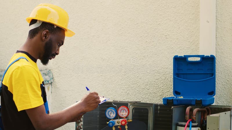 Technician Inspecting Freon Levels Stock Photo - Image of repair ...