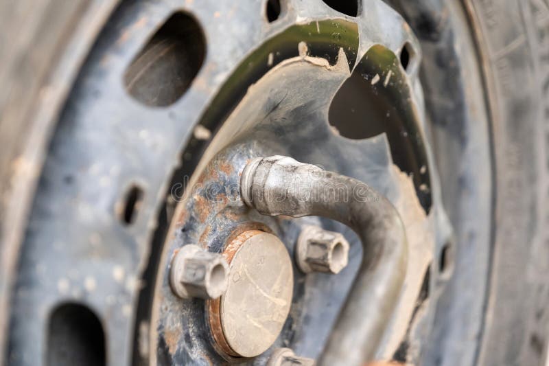 Precision Car Tyre Removal stock image. Image of rubber - 321374351