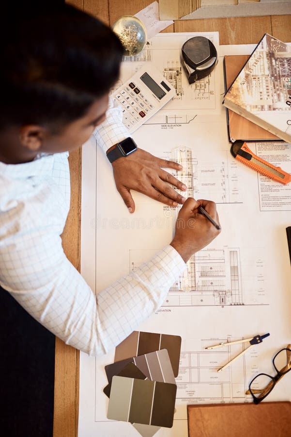 With Precision Comes Perfection. High Angle Shot of an Architect Using ...