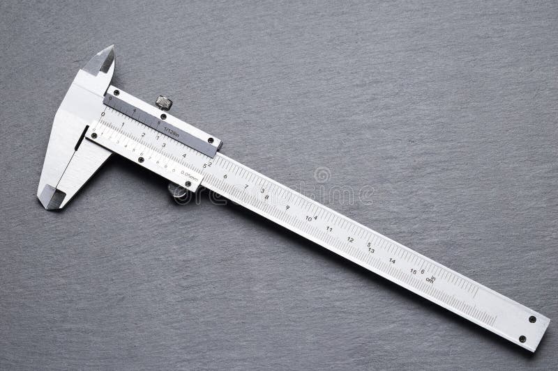 Precision Measuring Tool on Gray Slate Surface Stock Photo - Image of ...
