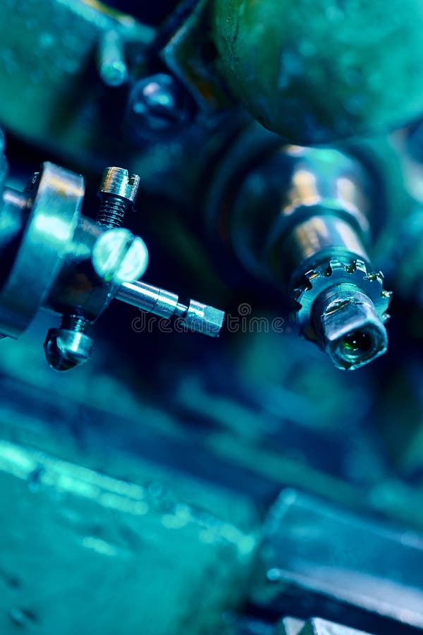 Precision Milling Machine at Work Crafting Intricate Clockwork Pinion ...