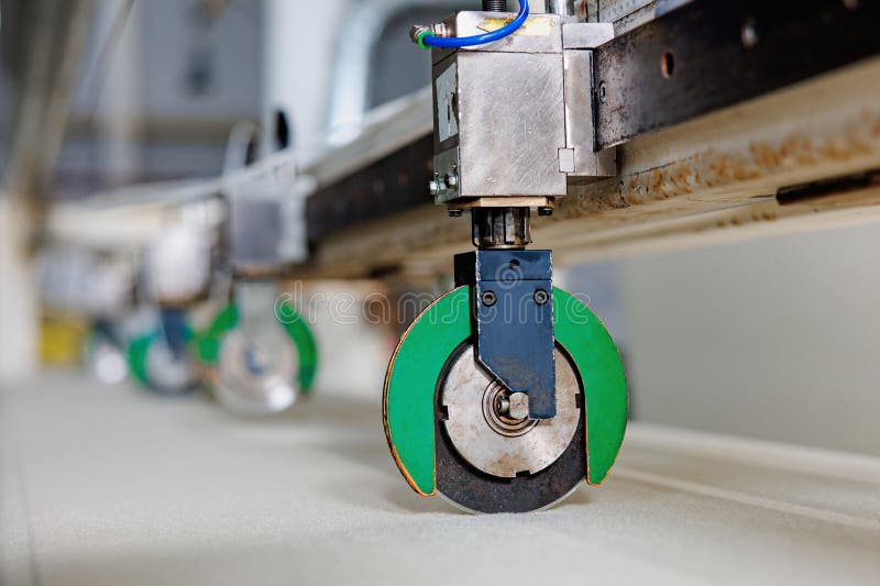 Precision in Motion: a Glimpse into a Cutting Machine Deftly Slicing ...