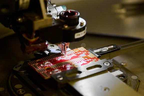 Precision Wire Bonder in Operation for Die Bonding on Printed Circuit ...
