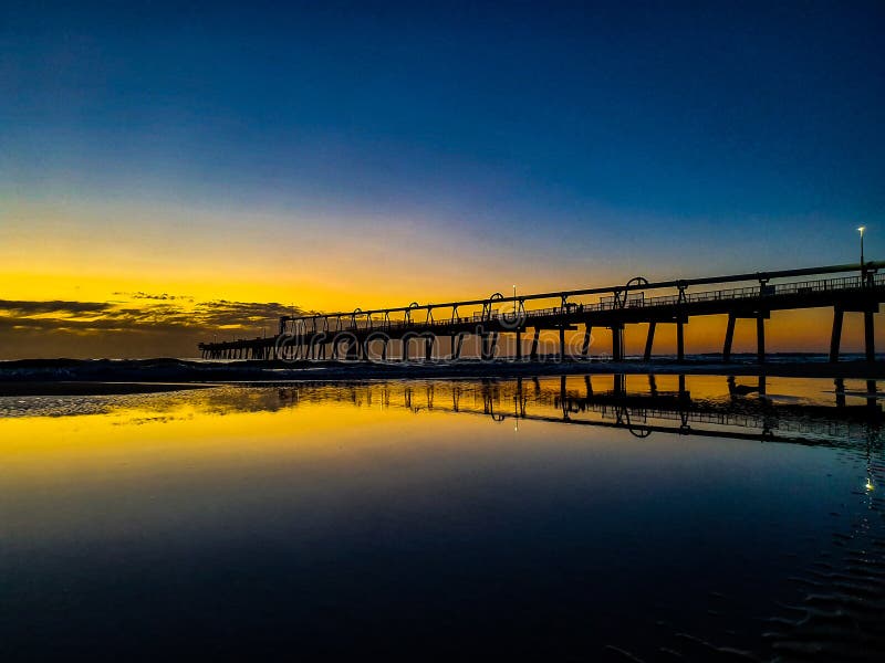 Predawn stock photo. Image of predawn, sand, jetty, beach - 143456394