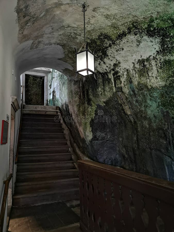 Predjama castle foundation stock photo. Image of cave - 150676782