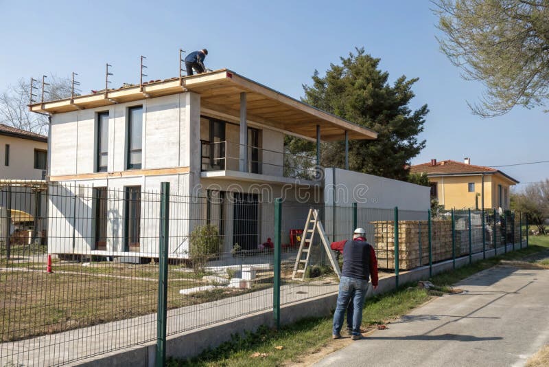 Prefab Villa Under Construction with Fence Installation Stock ...