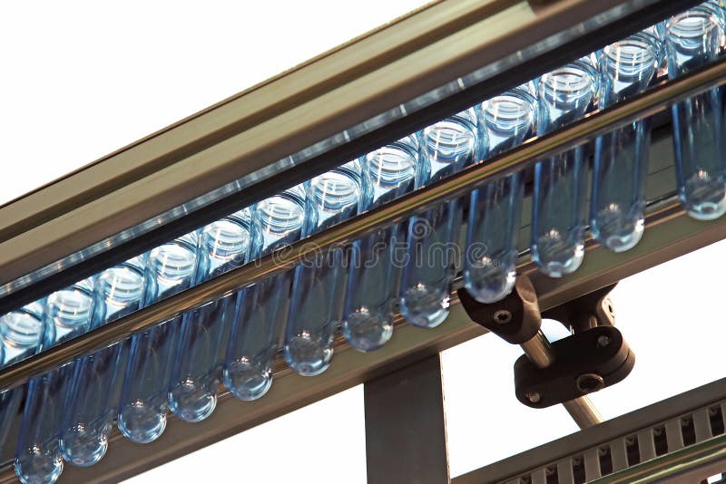 Conveyor with preform stock image. Image of conveyor - 157568185