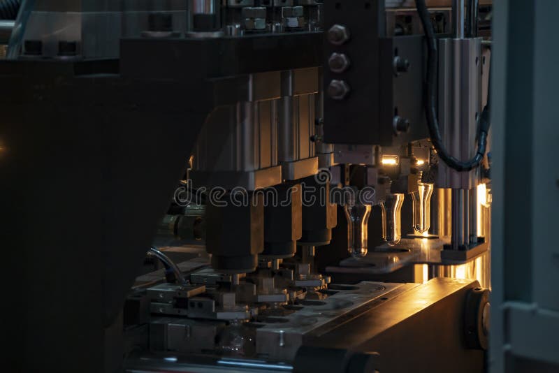 The Preform Shape in the Blowing Mold for Plastic Bottles Stock Image ...