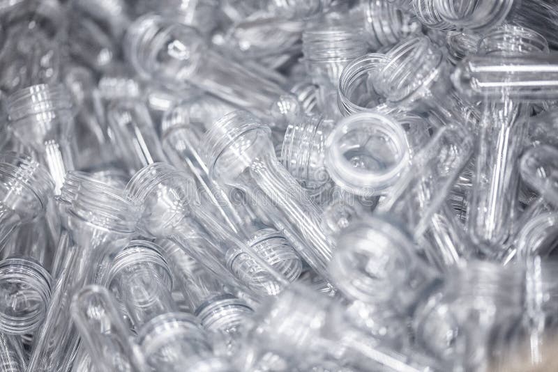 Preforms for Making PET Plastic Bottles. Raw Material Line Factory ...