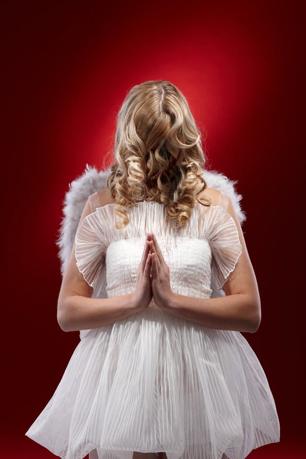 Angelo Che Prega Su Un Ginocchio Fotografia Stock - Immagine di ...