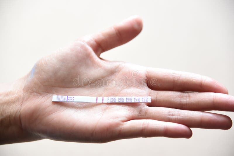 Pregnancy Test Pack Kit Set on Hand with Positive Test Stock Photo ...