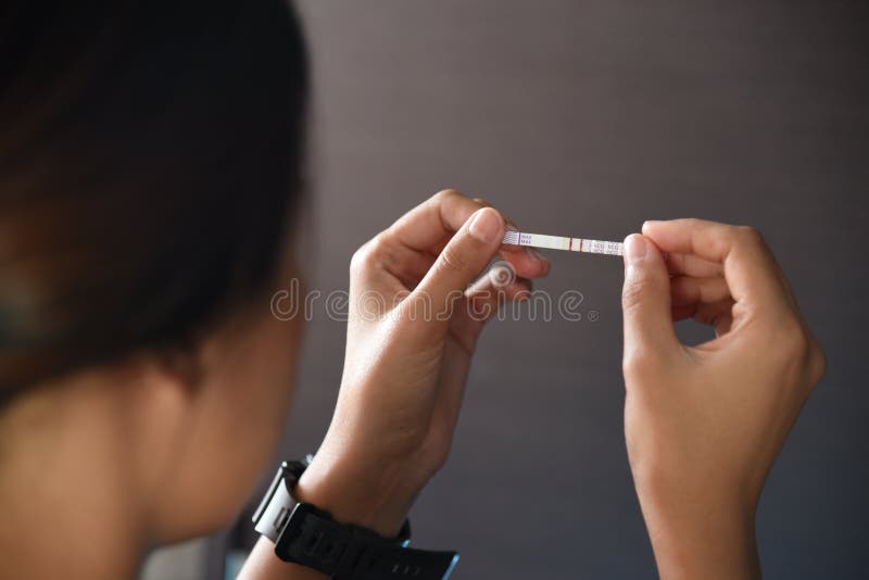 Pregnancy Test Pack Kit Set on Hand with Positive Test Stock Photo ...