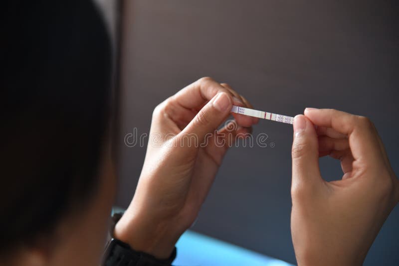 Pregnancy Test Pack Kit Set on Hand with Positive Test Stock Image ...