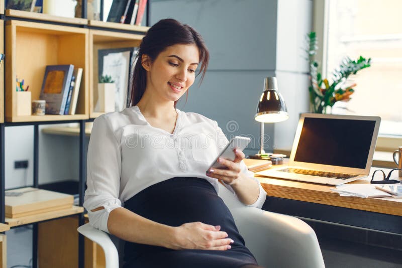 Pregnant Business Woman Working At Office Motherhood Sitting Browsing
